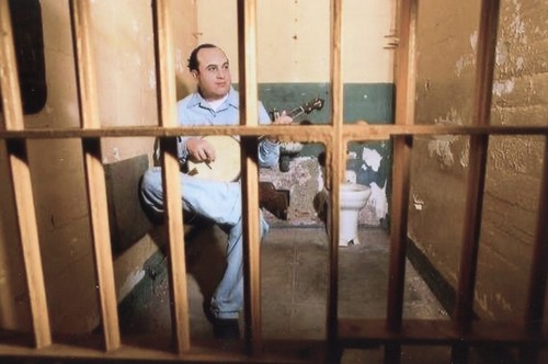 RARE COLOR STILL AL CAPONE PLAYING HIS BANJO IN HIS CELL AT SING SING ...