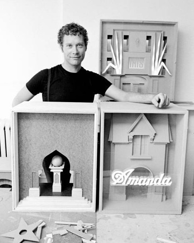 artist Cletus Johnson as he poses with several of his works in his- Old ...