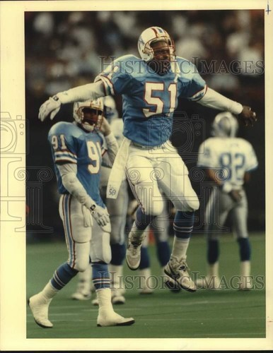 1989 Press Photo Houston Oiler Eric Fairs Celebrates Interception vs ...
