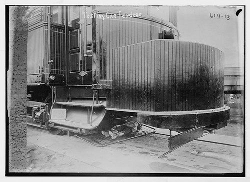 Testing car fender on end of railroad car,human body,locomotive,RR ...