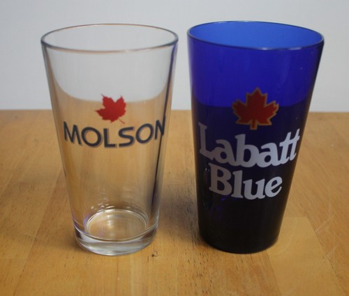 2 Canadian Beers, glasses Molson (clear) and Labatt Blue (Cobalt Blue ...