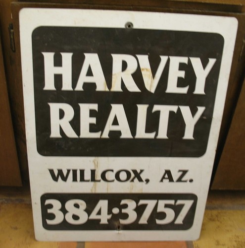 F11 - HARVEY REALTY WILLCOX ARIZONA ALUMINUM SIGN, Measures 24" x 18 ...