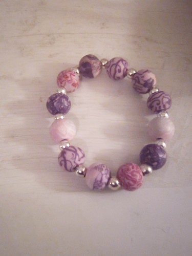 Stretch Bracelet Purplelish Shades. Round Beads Black Cord 8in. | eBay