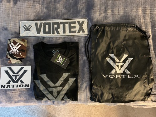 Vortex Alum. sign 4”x15”, Lg T Shirt, Couzie, Draw String Bag & Sticker ...