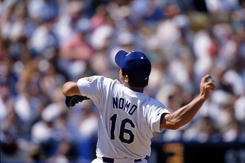 Pitcher Hideo Nomo Los Angeles Dodgers focuses on his target as he- Old ...