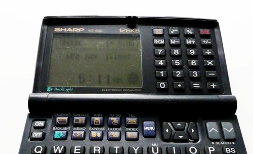 Vintage calculator COMPUTER/CALCULATOR...SHARP 128KB...WORKS FINE…80s ...