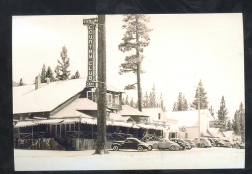 REAL PHOTO STATELINE NEVADA STREET SCENE OLD CARS WINTER SNOW POSTCARD ...