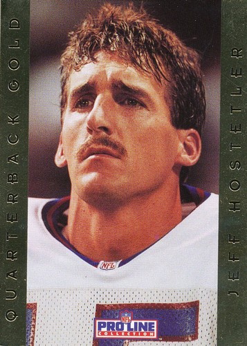 QUARTERBACK-GOLD Jeff Hostetler INSERT RAIDERS REDSKINS GIANTS WVU ...