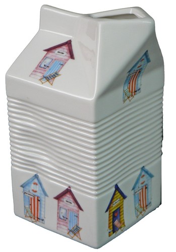 Milk carton shaped jug off white ceramic decorated with colourful beach ...